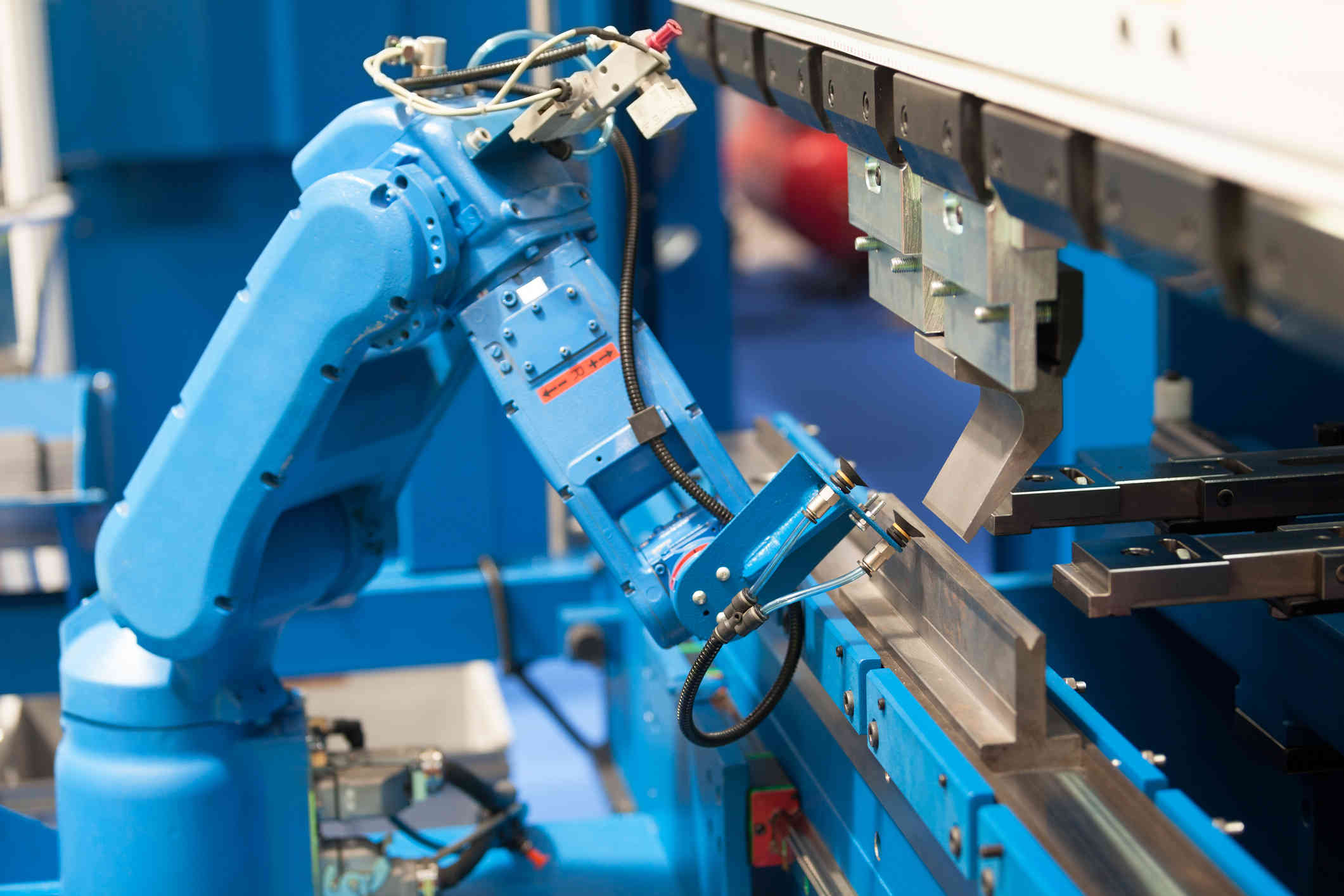 Industrial robots are helping the US cut costs and improve productivity ...